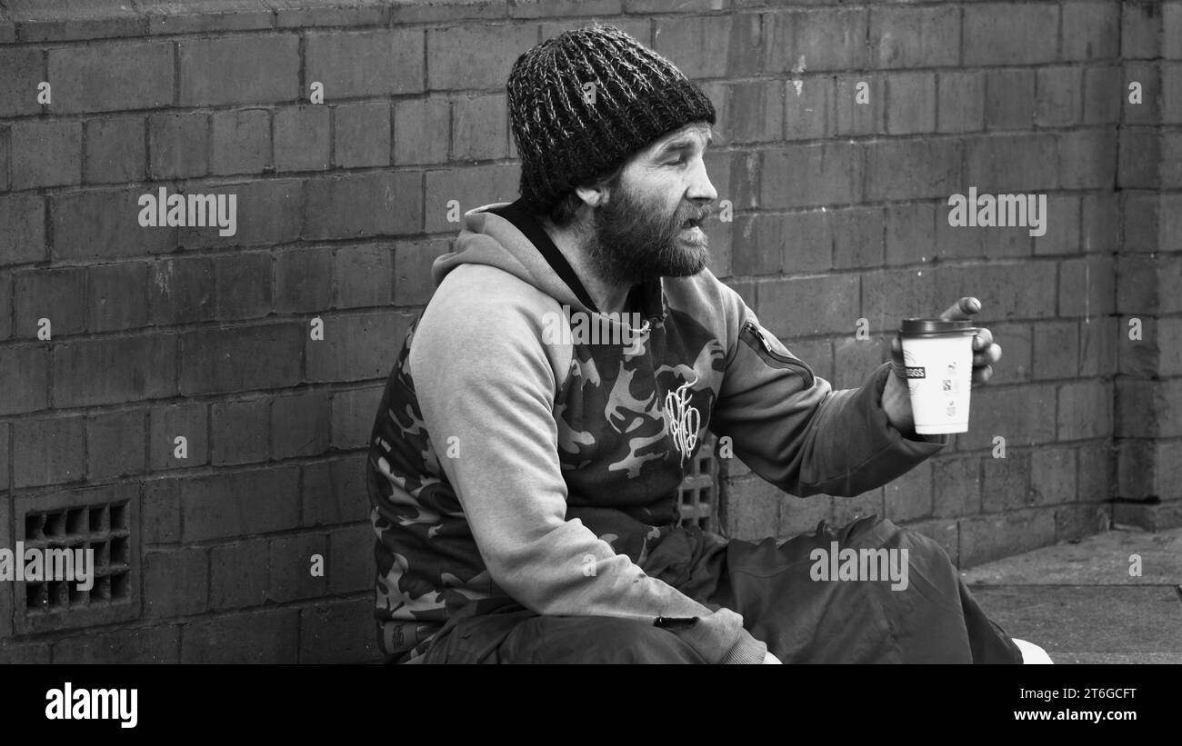 Destitution in the city centre of Cardiff. A homeless man on the ...