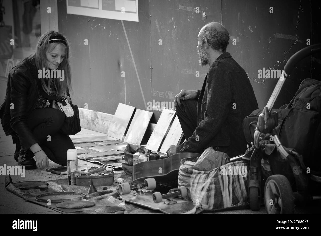 Destitution in the centre of Cardiff. A homeless man, with fingers ...