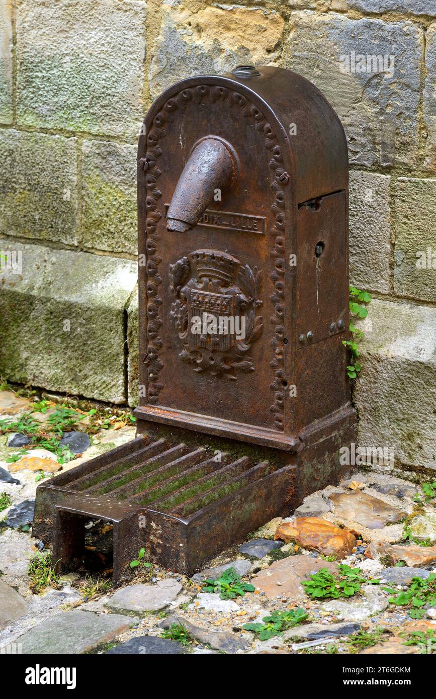 Old ornate cast iron water fountain, Rue de la Prison, Honfleur ...