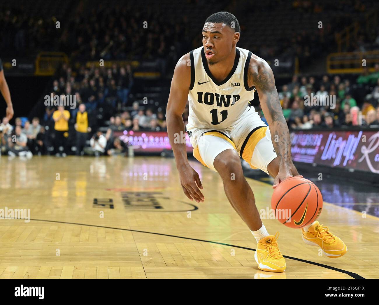 IOWA CITY, IA - NOVEMBER 07: Iowa guard Tony Perkins (11) drives to the ...