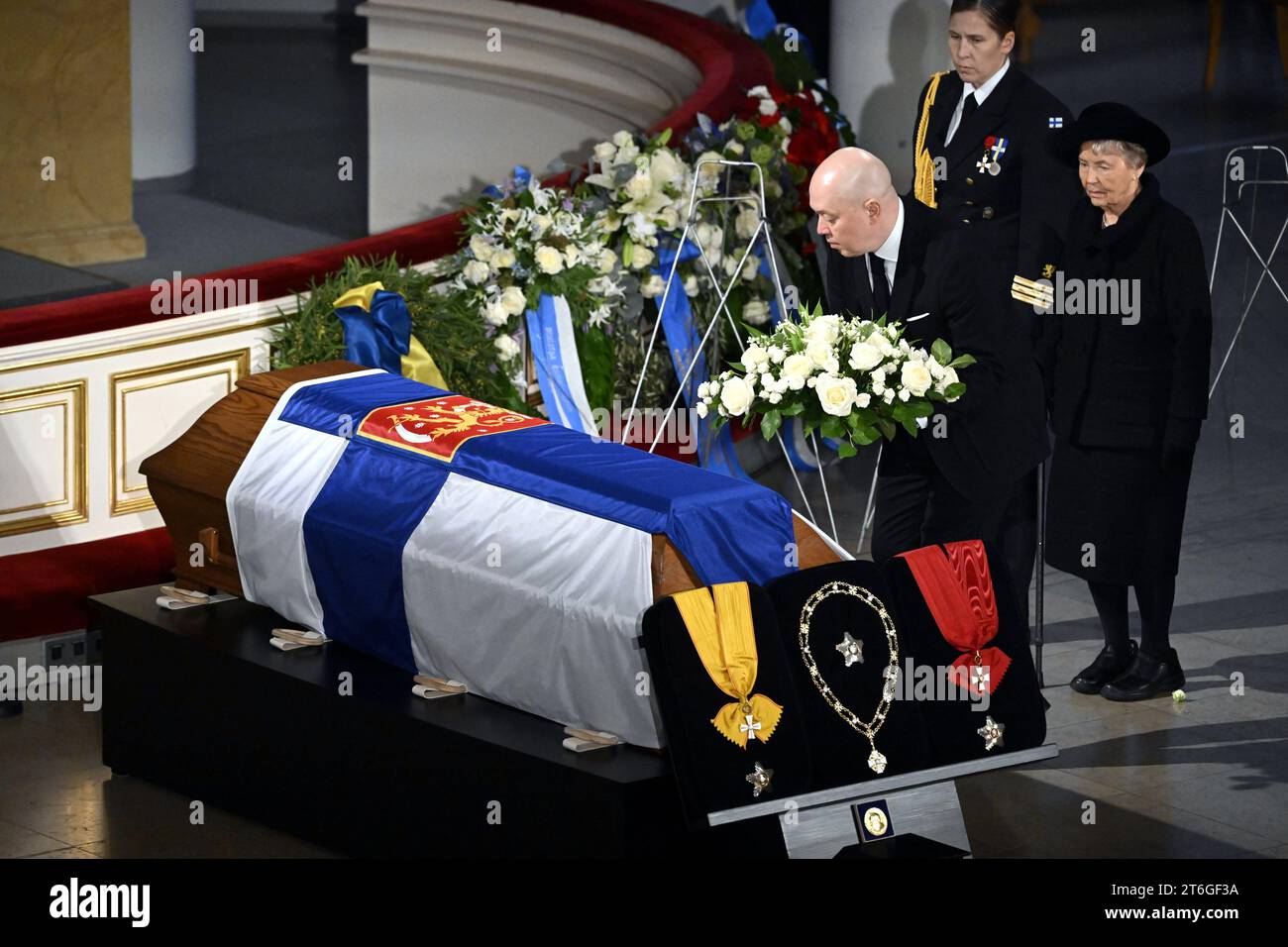 Helsinki, Finland. 10th Nov, 2023. Widow Eeva Ahtisaari and son Marko Ahtisaari pay respect by ...