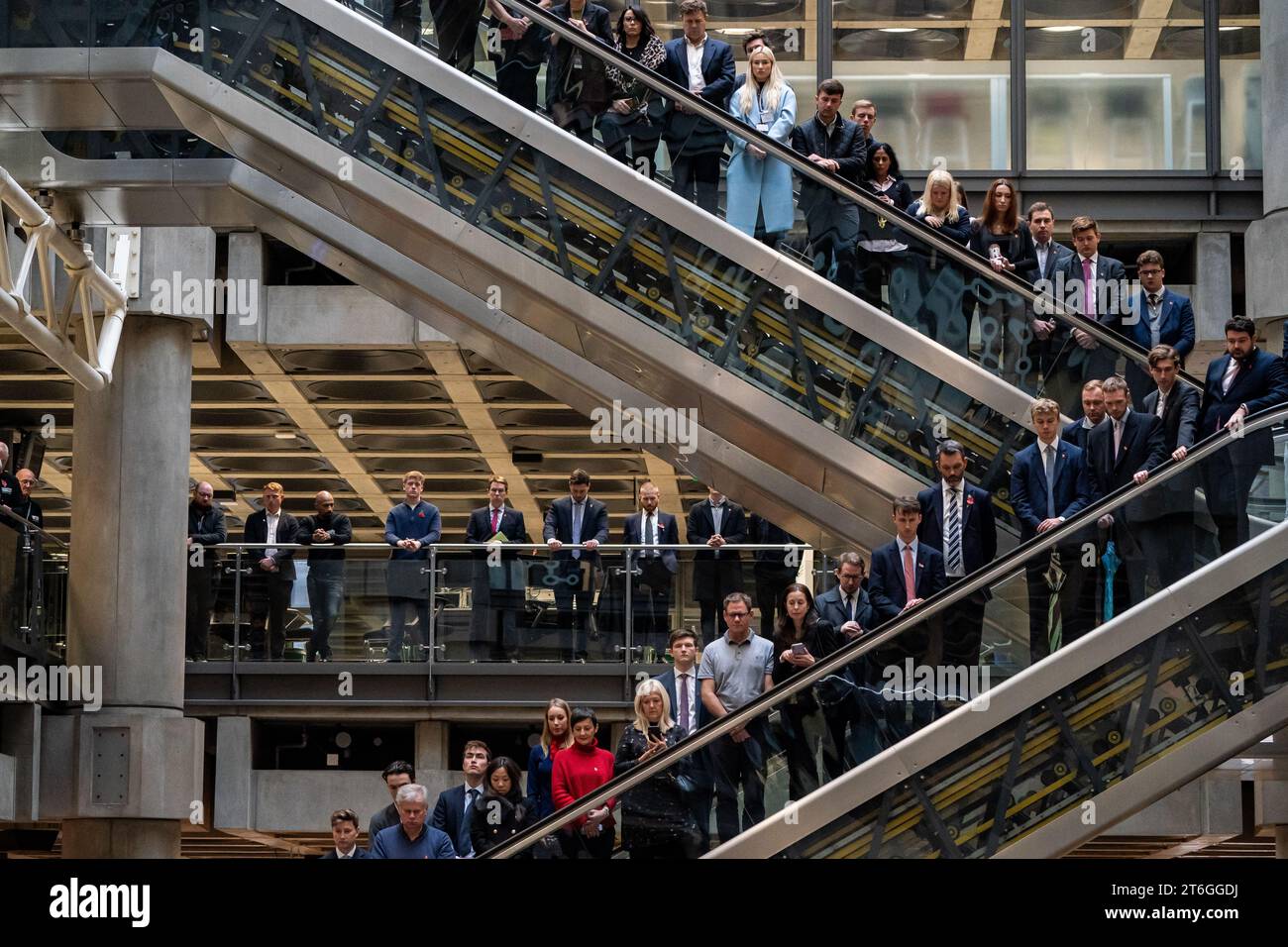 City workers join a Remembrance Day ceremony at Lloyd's of London, in ...