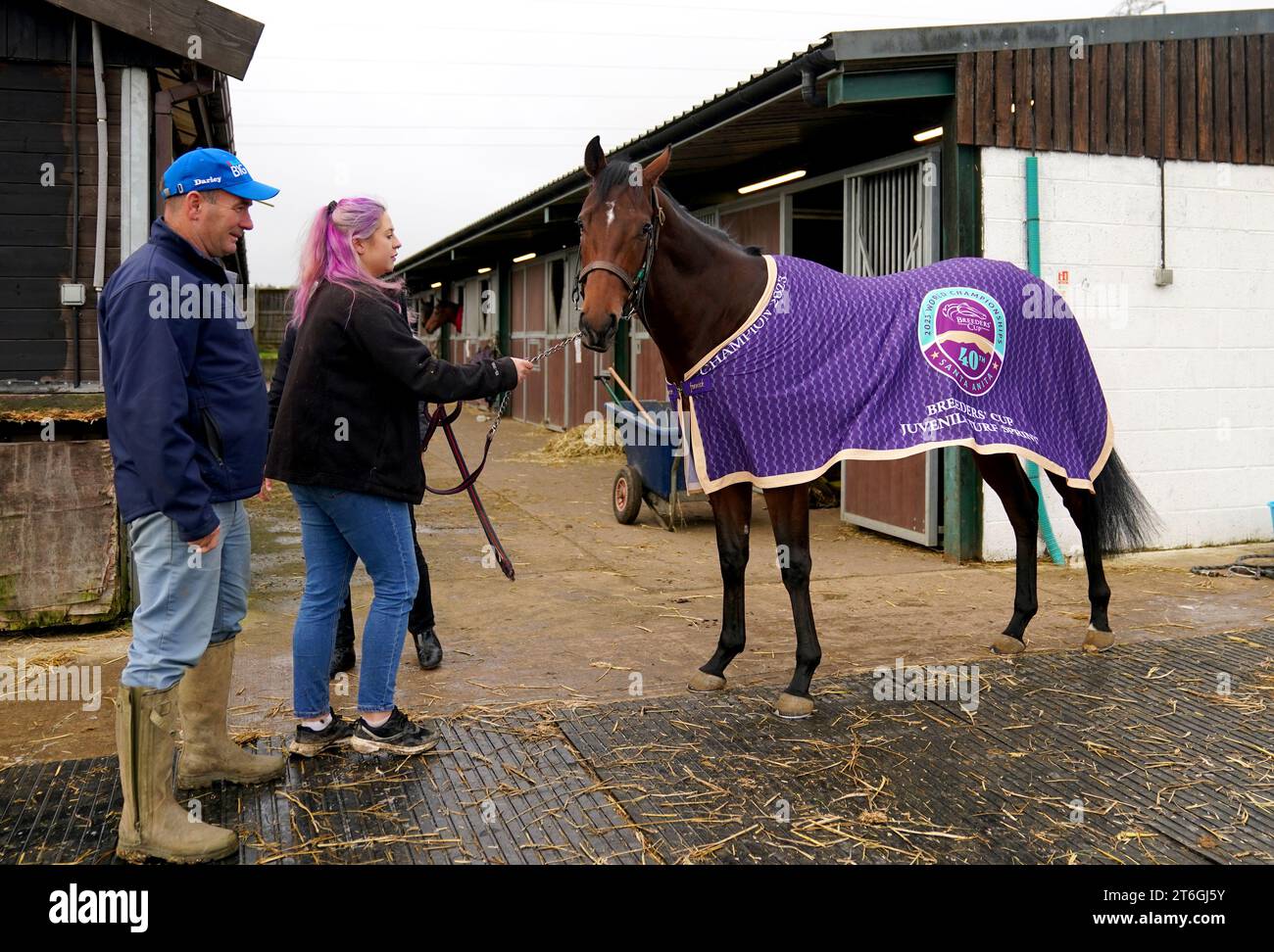 Big Evs with trainer Mick Appleby and head girl Tara Belfield during a ...