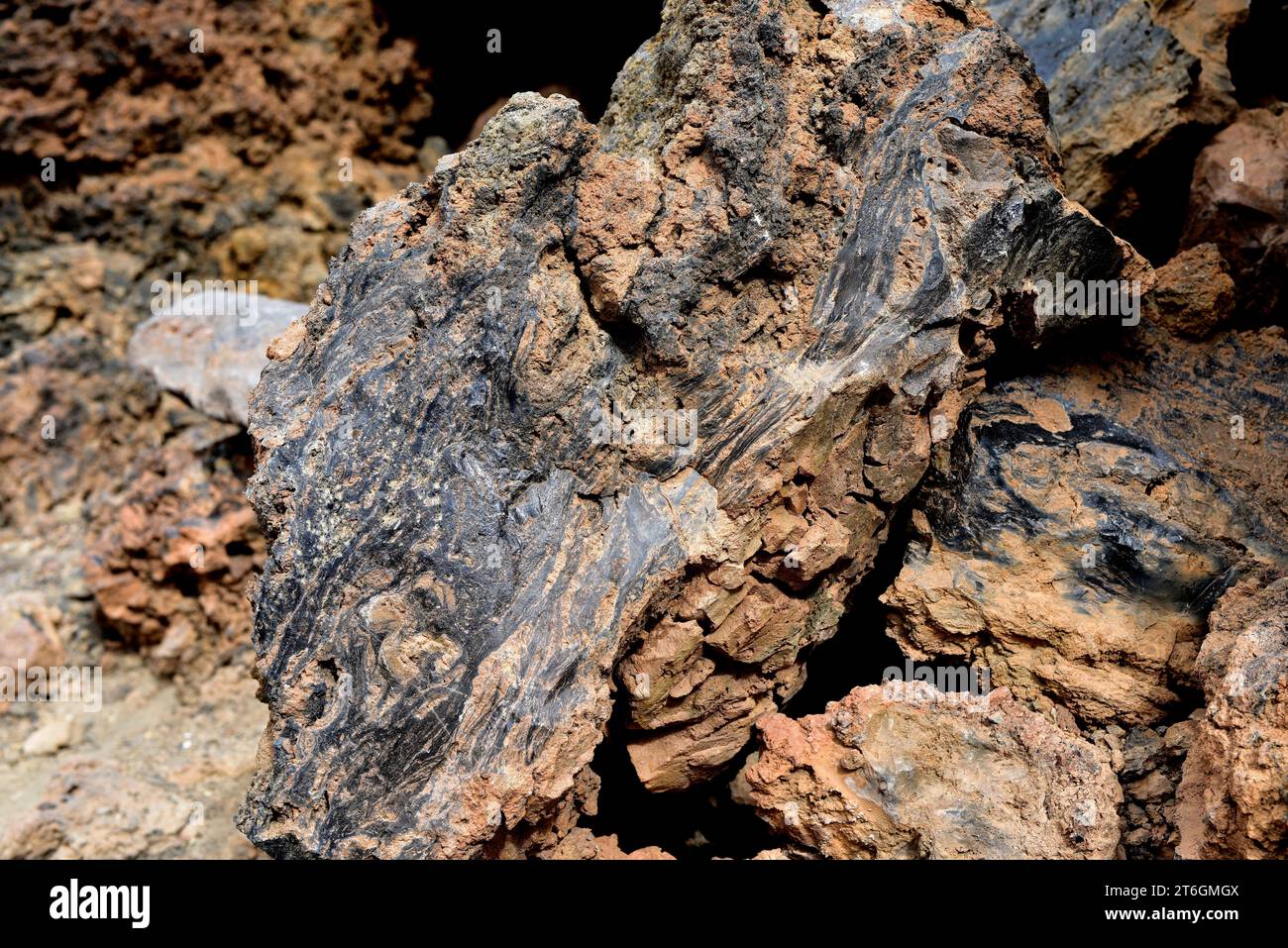 Obsidian is a volcanic glass formed from felsic lava. Cañadas del Teide ...