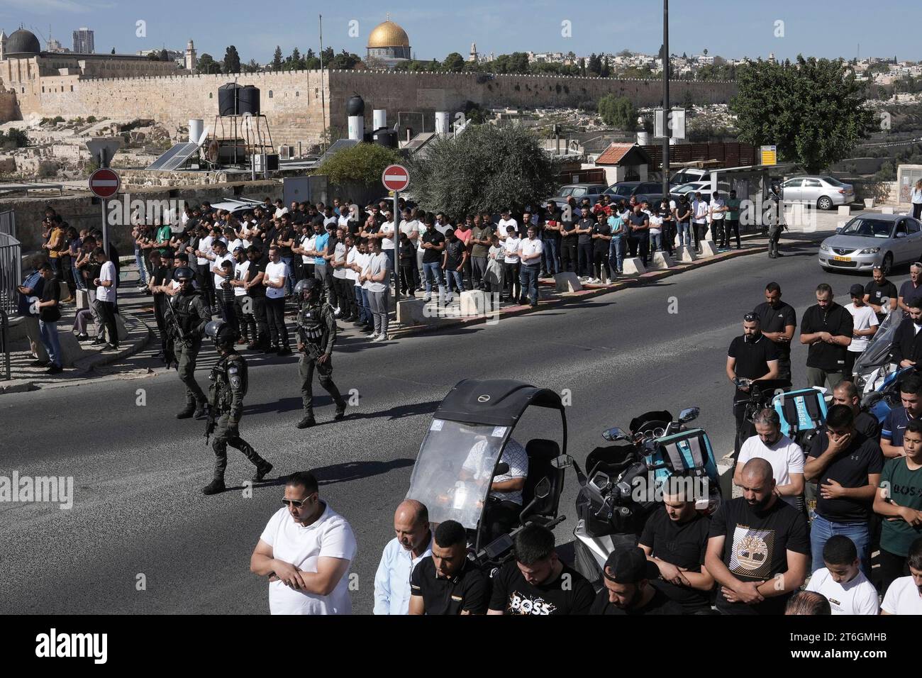 Palestinian Muslim worshipers who were prevented from entering the Al ...