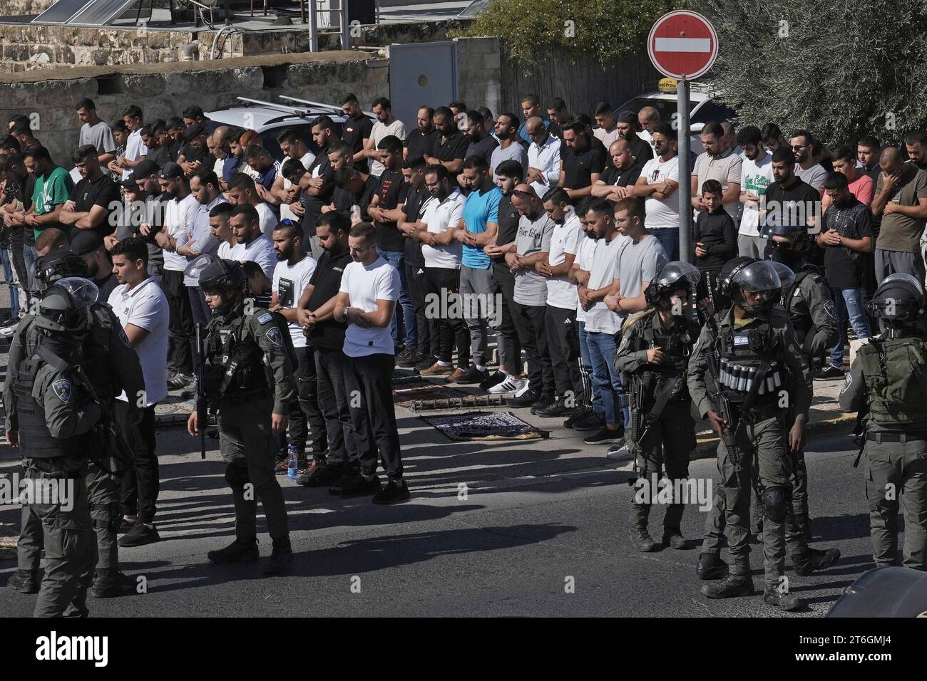 Israeli riot police stand guard as Palestinians who were prevented from ...