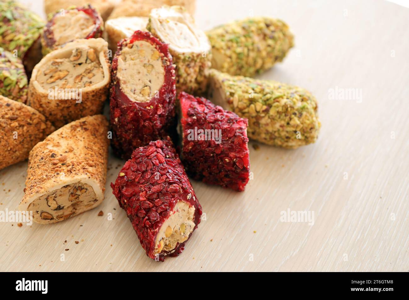 Rolls of turkish delight with different flavors and fillings close up ...