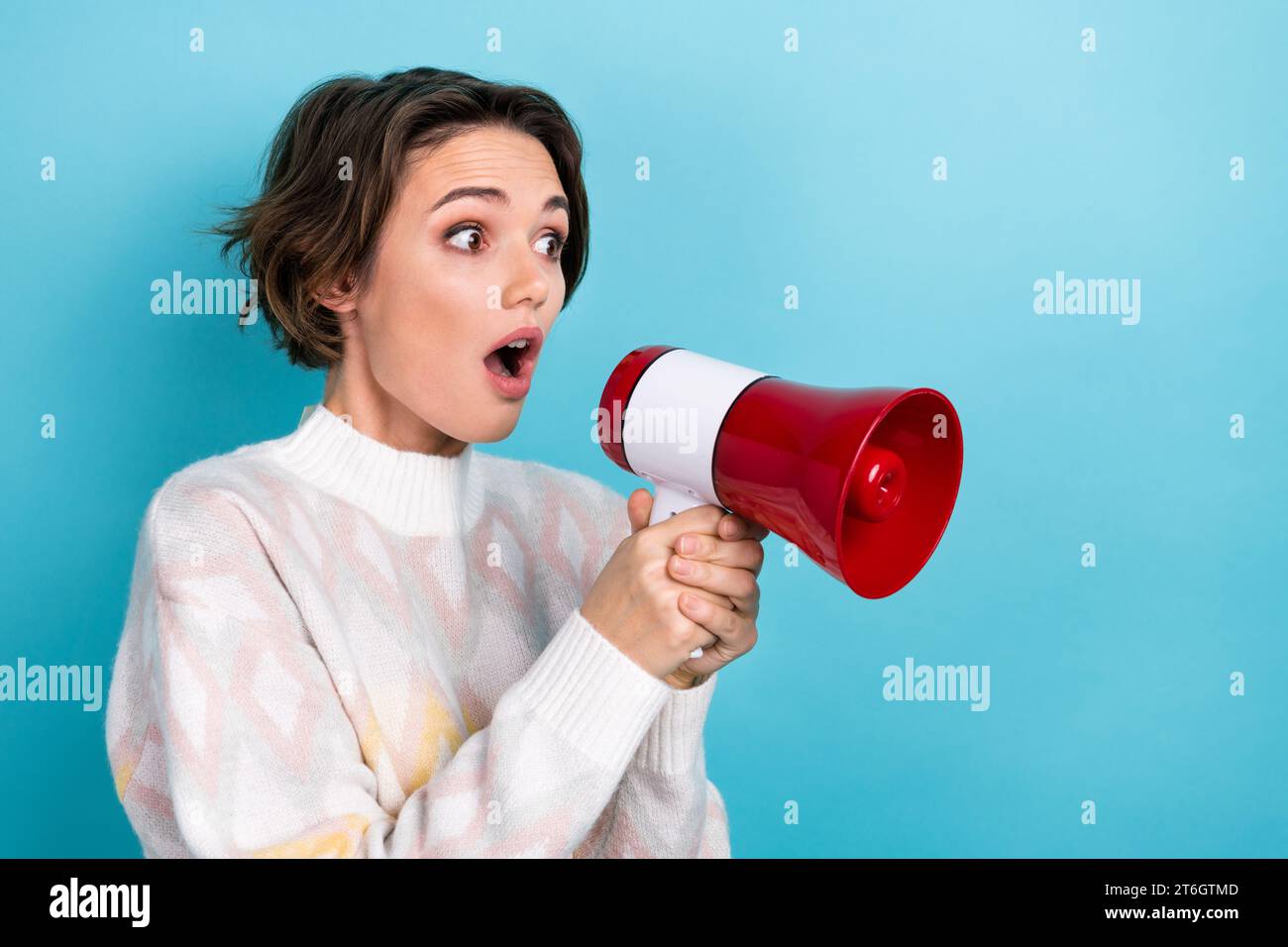 Photo portrait of pretty young girl astonished scream megaphone dressed ...