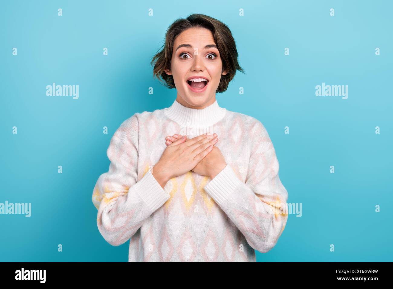 Photo of astonished nice person open mouth arms touch chest cant ...