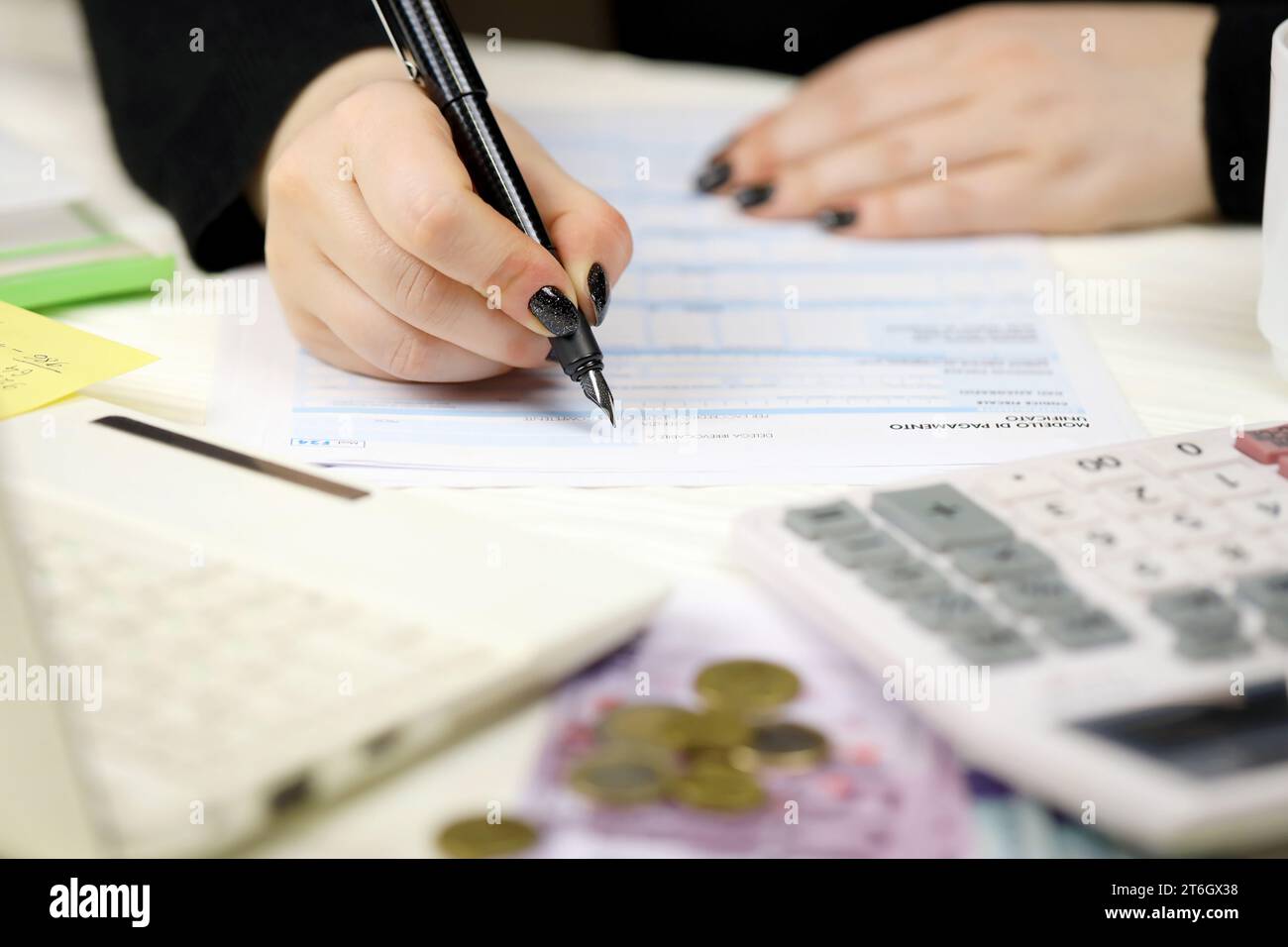 Accountant fill italian tax form F24 Unified payment model in end of ...