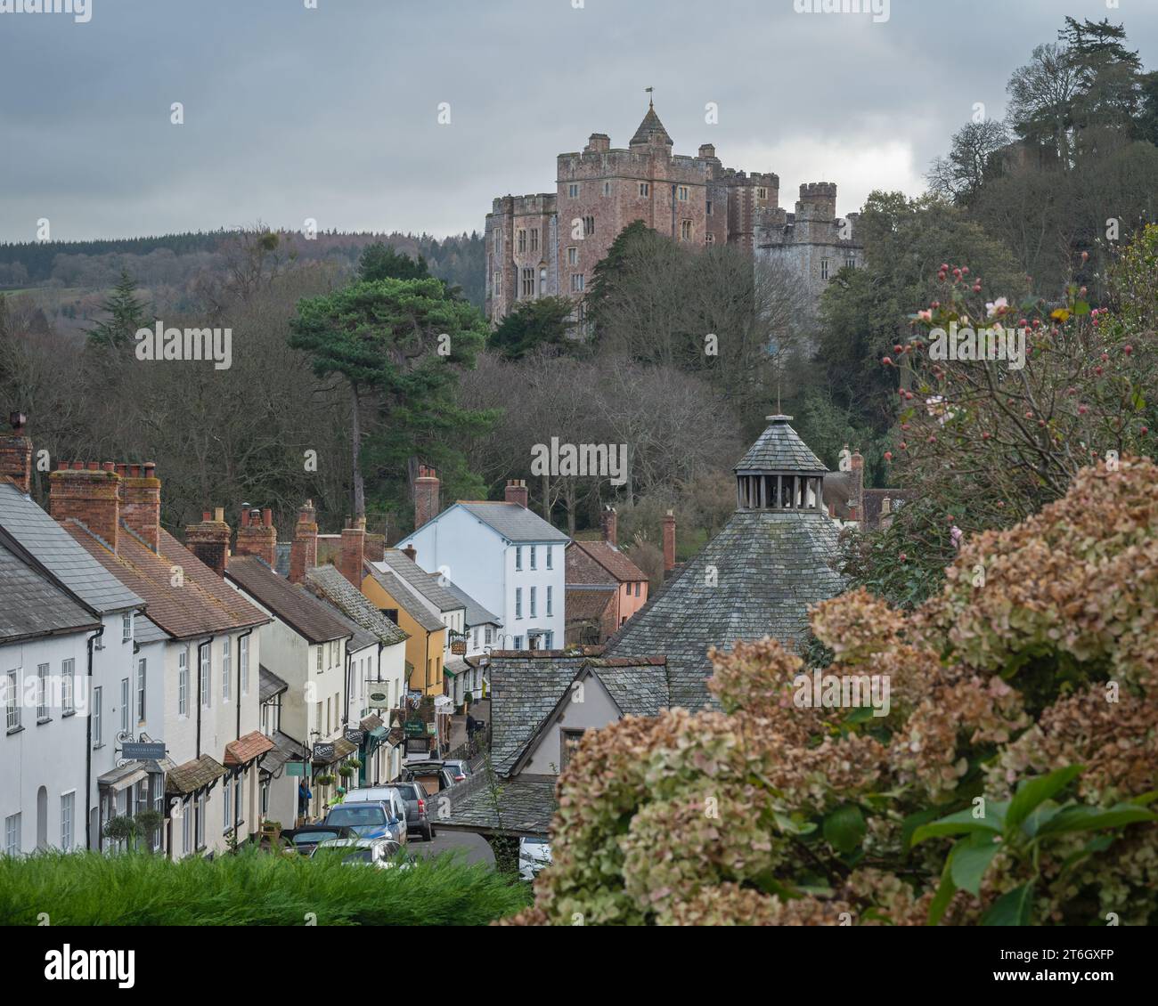 View along High Street in Dunster, Somerset, England, UK showing some ...