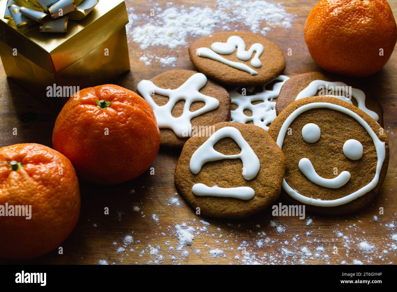 Gingerbread sweet cookies covered with white icing with various ...
