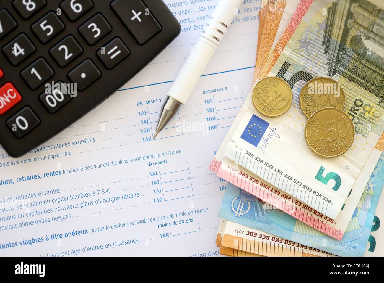 Filling french tax form process with calculator hi-res stock ...