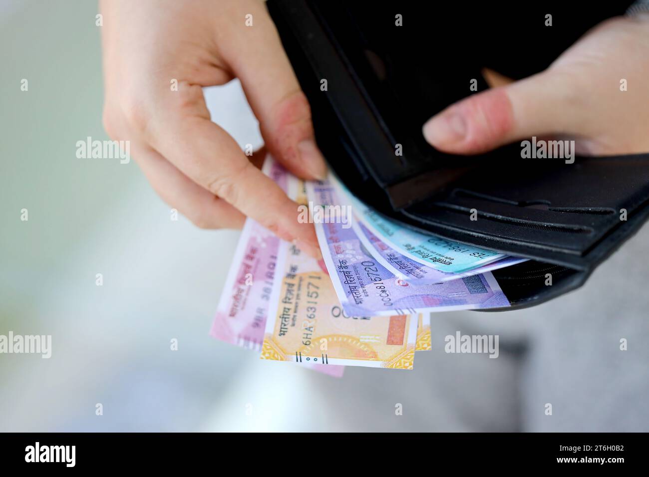 Woman hand with indian rupees bills close up. Concept of financial ...