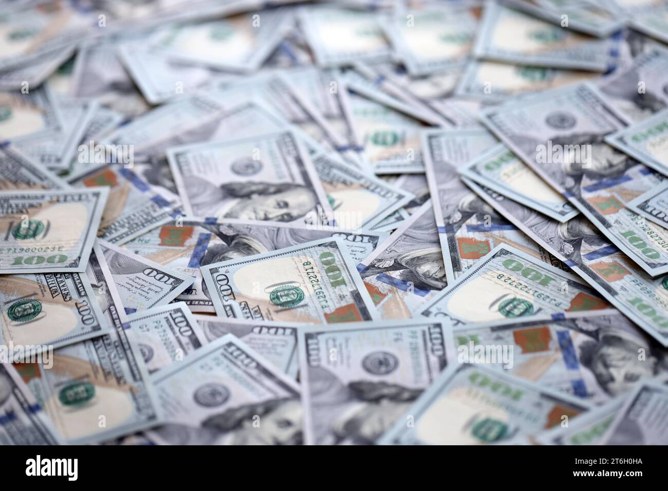 Very big amount of US hundred dollar bills close up. Huge quantity of ...