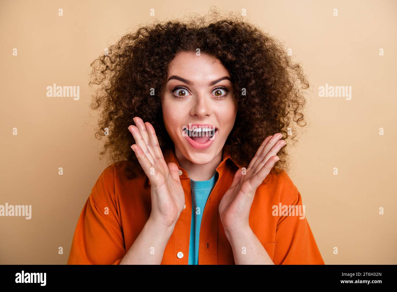 Photo portrait of lovely young lady raise hands impressed reaction ...