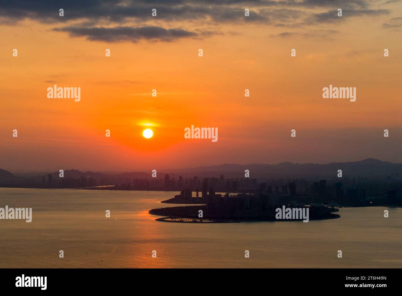 QINGDAO, CHINA - NOVEMBER 10, 2023 - Sunset at Lingshan Bay Beach in ...