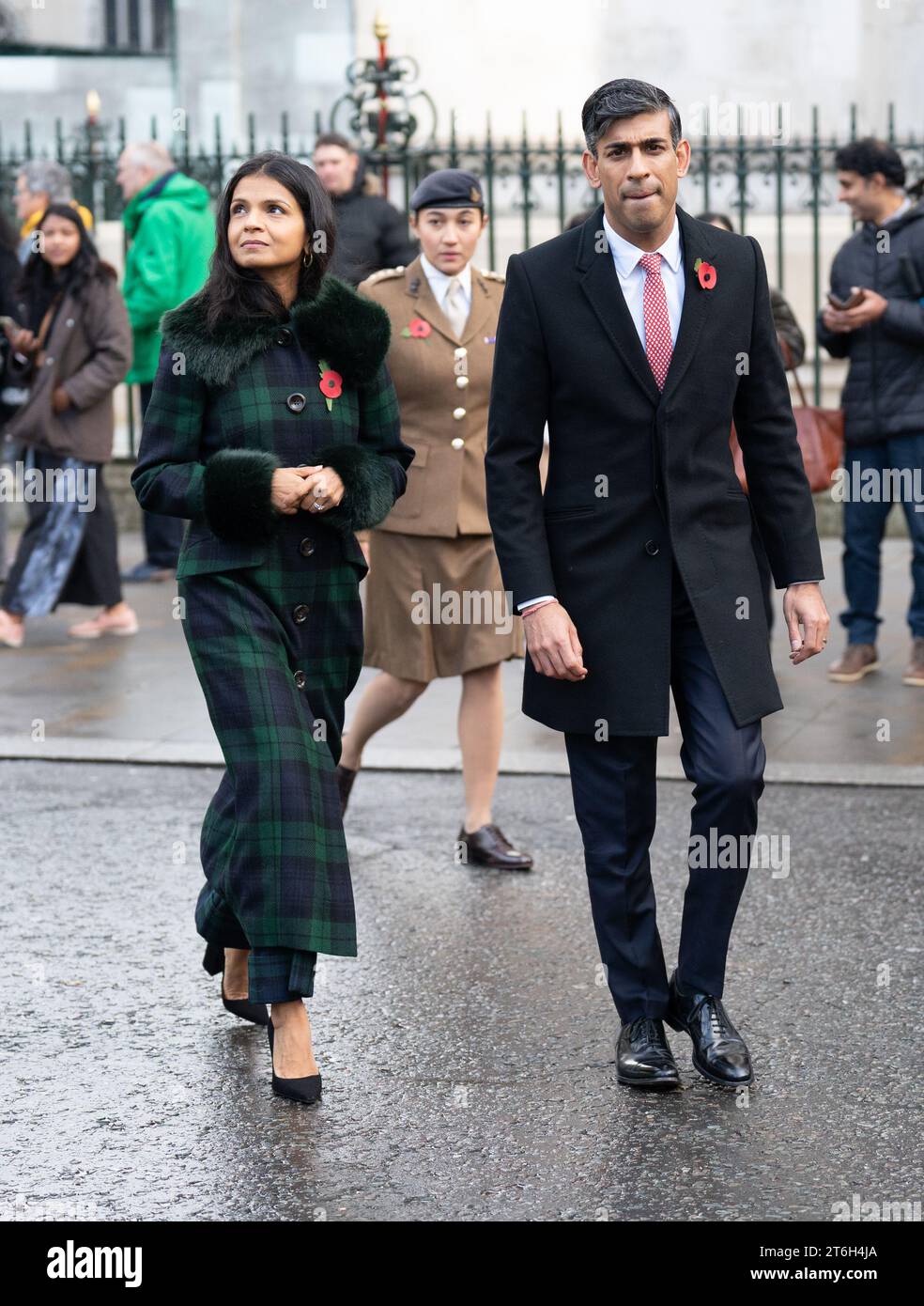 Prime Minister Rishi Sunak and his wife Akshata Murty leave after visiting the Field of ...