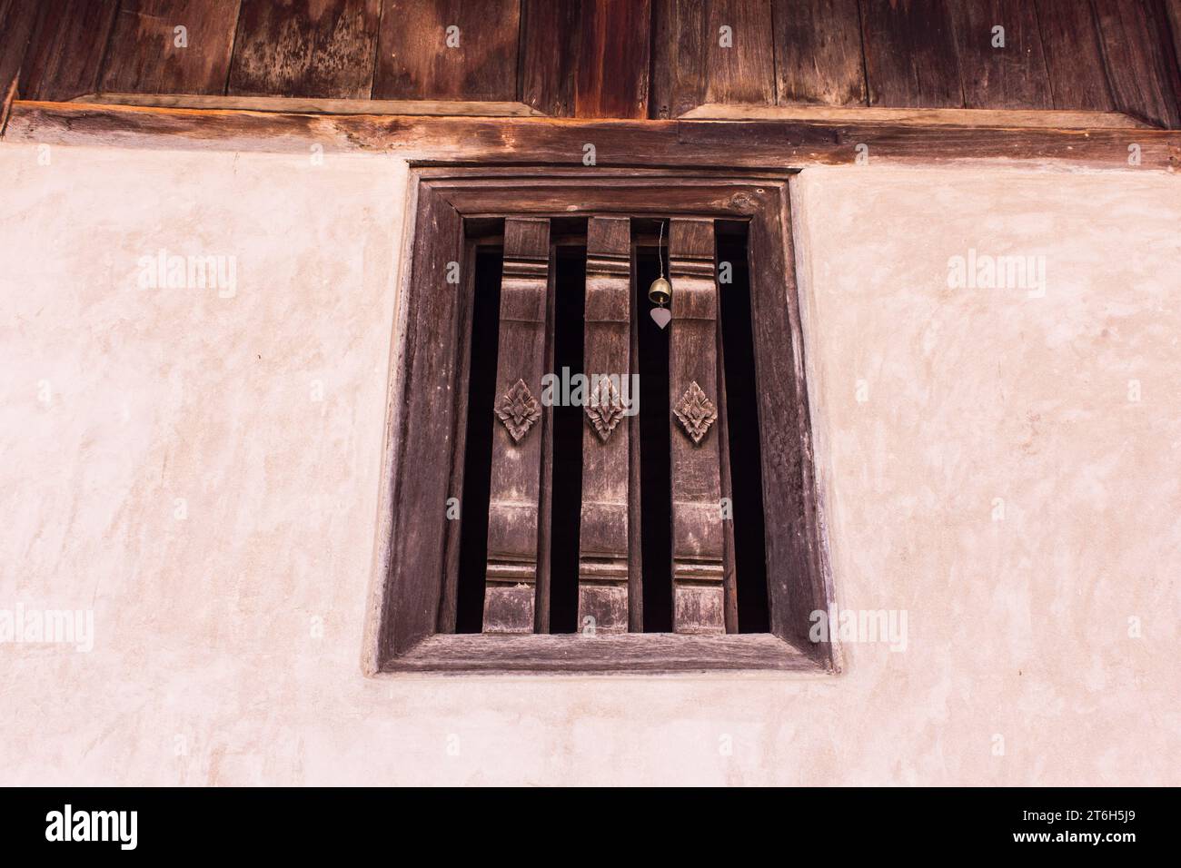 old wood window thai chapel Stock Photo - Alamy