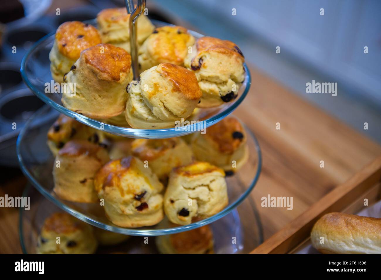 Traditional british scones with strawberry jam for tea time in cafe ...