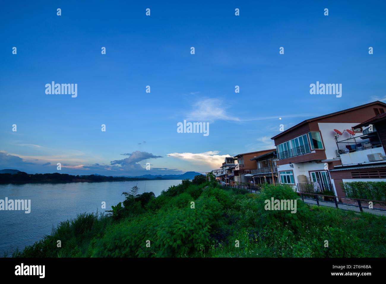 Landscape of classic wooden house beside the Mekong river in Chiang ...