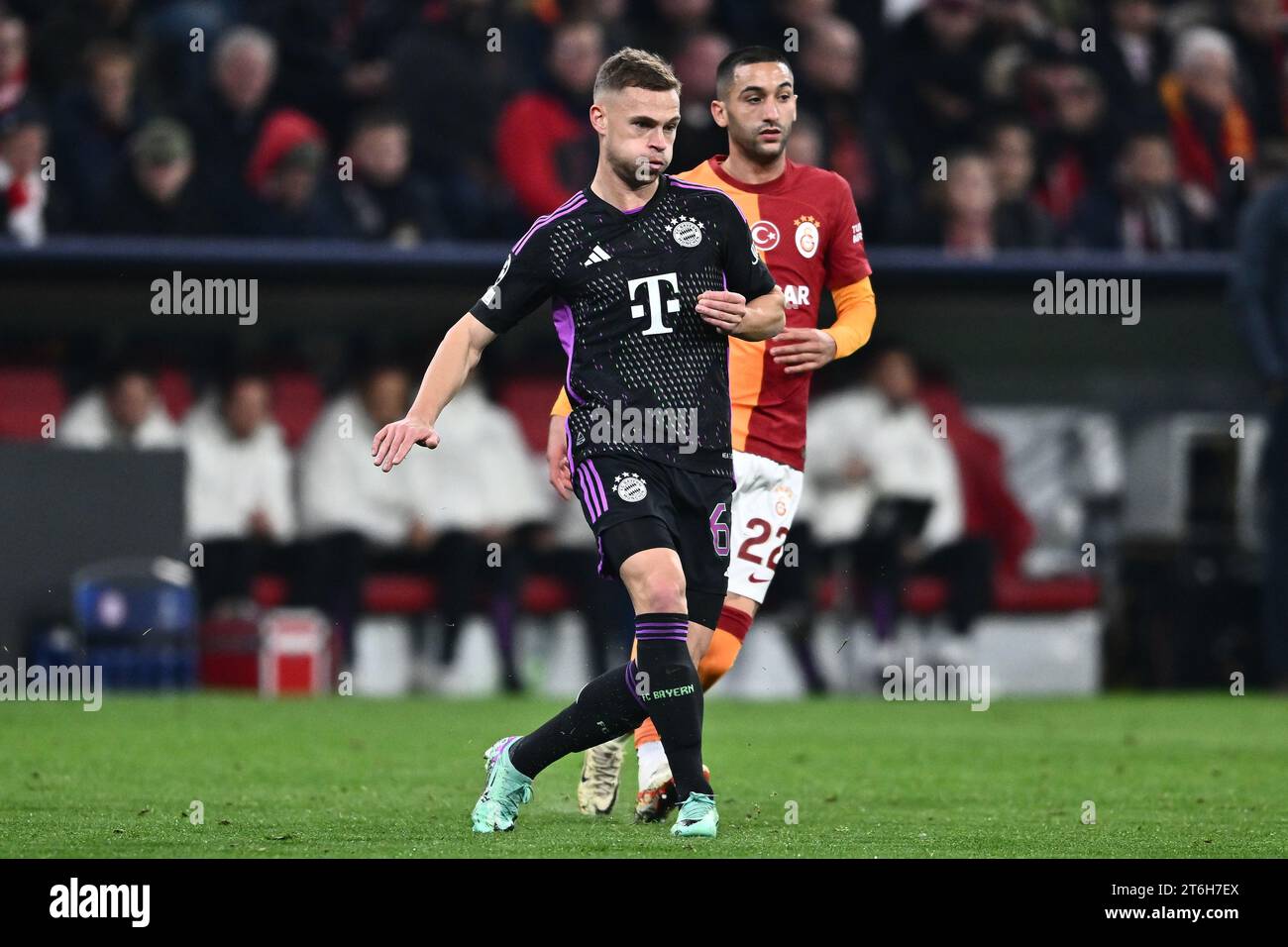 MUNICH, GERMANY - NOVEMBER 8: Joshua Kimmich of Bayern Munich and Hakim ...