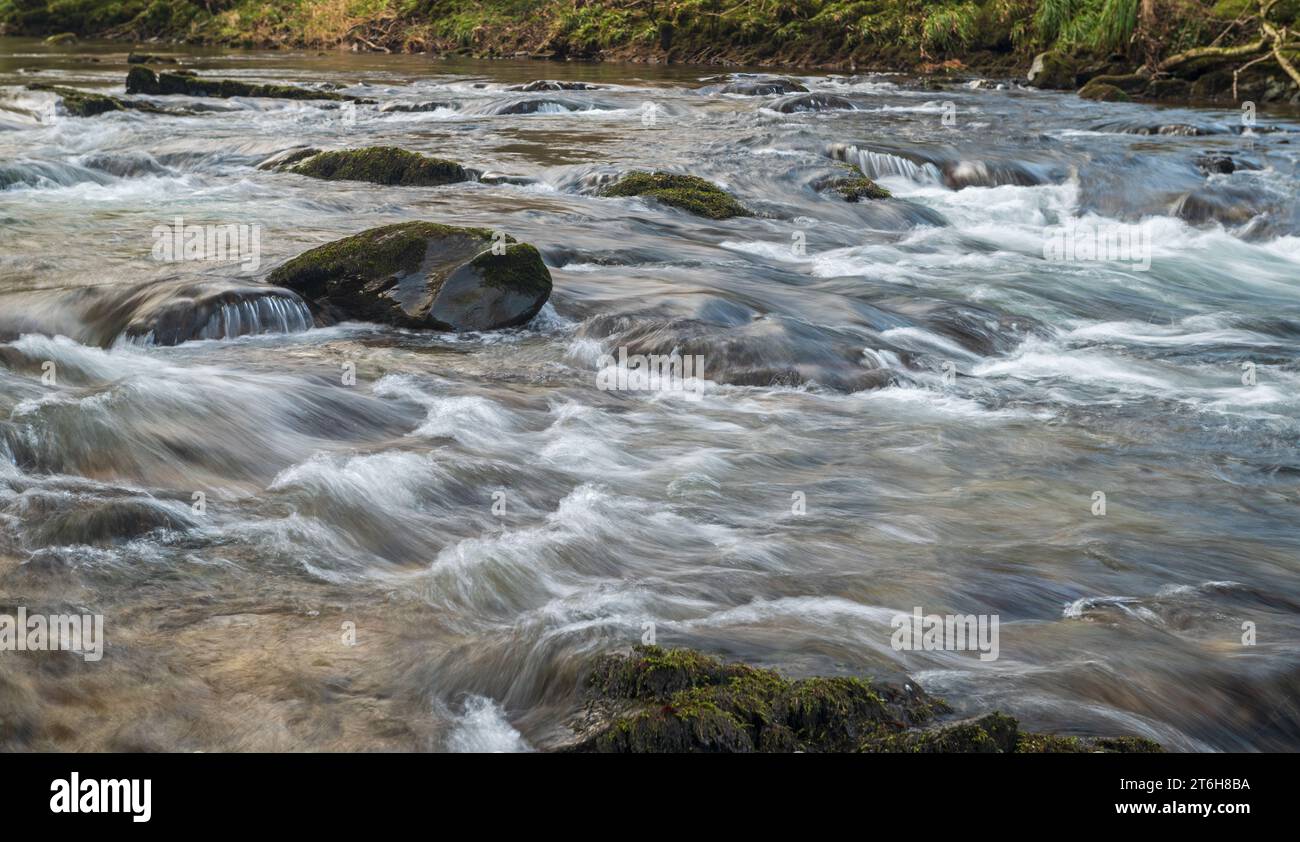 Autumnal view of the River Barle cascading over rocks near Dulverton in ...