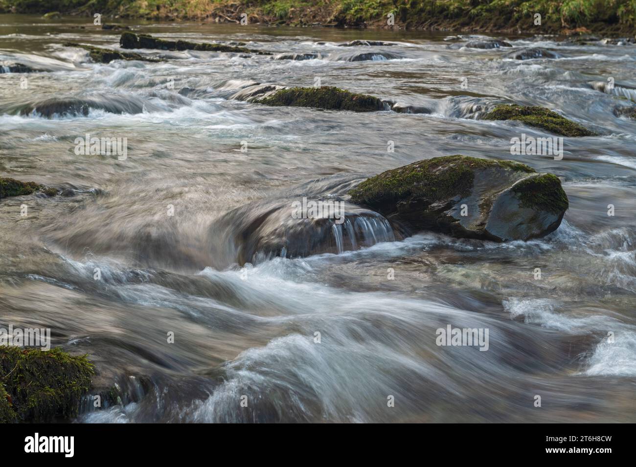 Autumnal view of the River Barle cascading over rocks near Dulverton in ...
