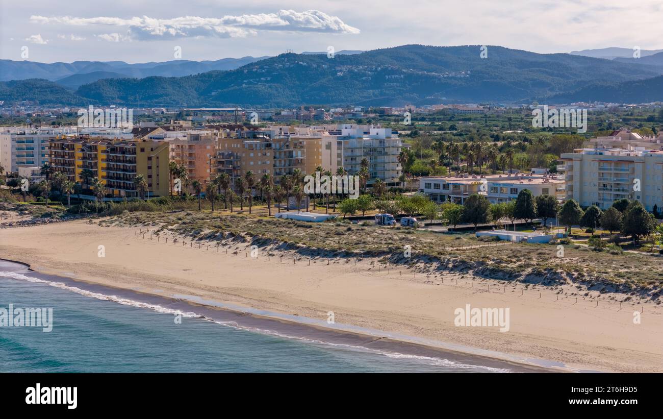 Aerial drone photo of apartment buildings next to the beach in the ...