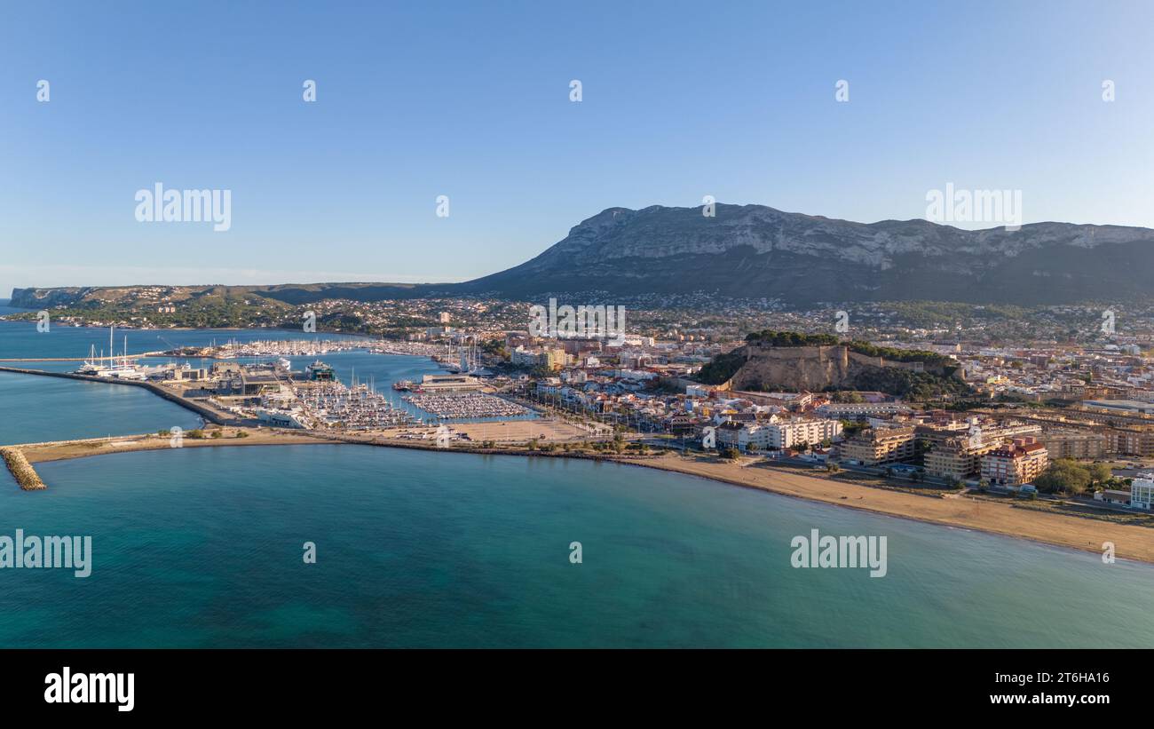 Aerial drone view of the coastal town named Denia. Denia is located at ...