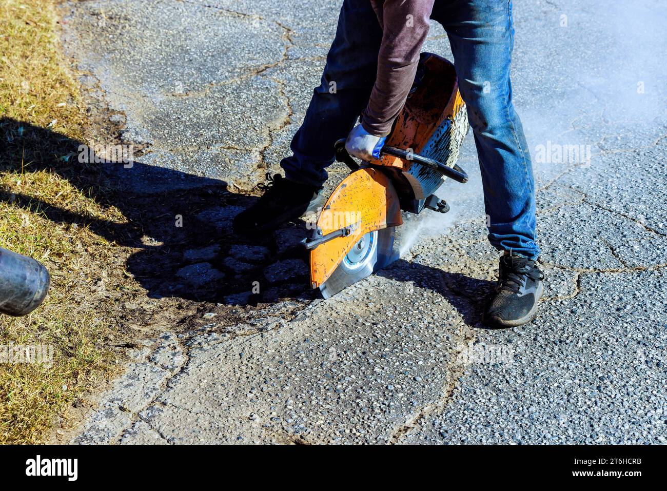 Repairing damaged asphalt cracks before installing new layer asphalt is ...