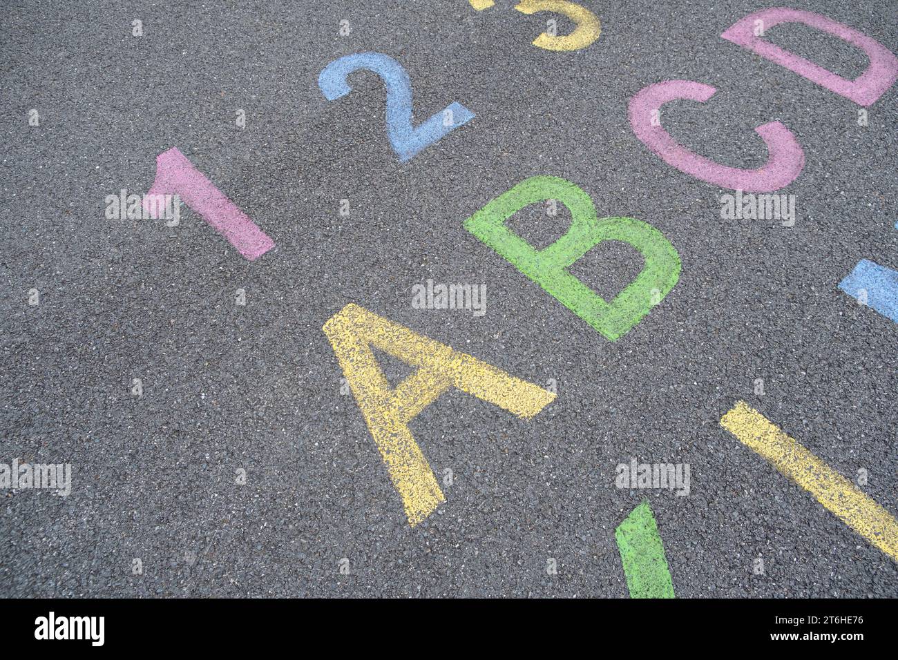 the alphabet and numbers are drawn with color paint on a children's ...