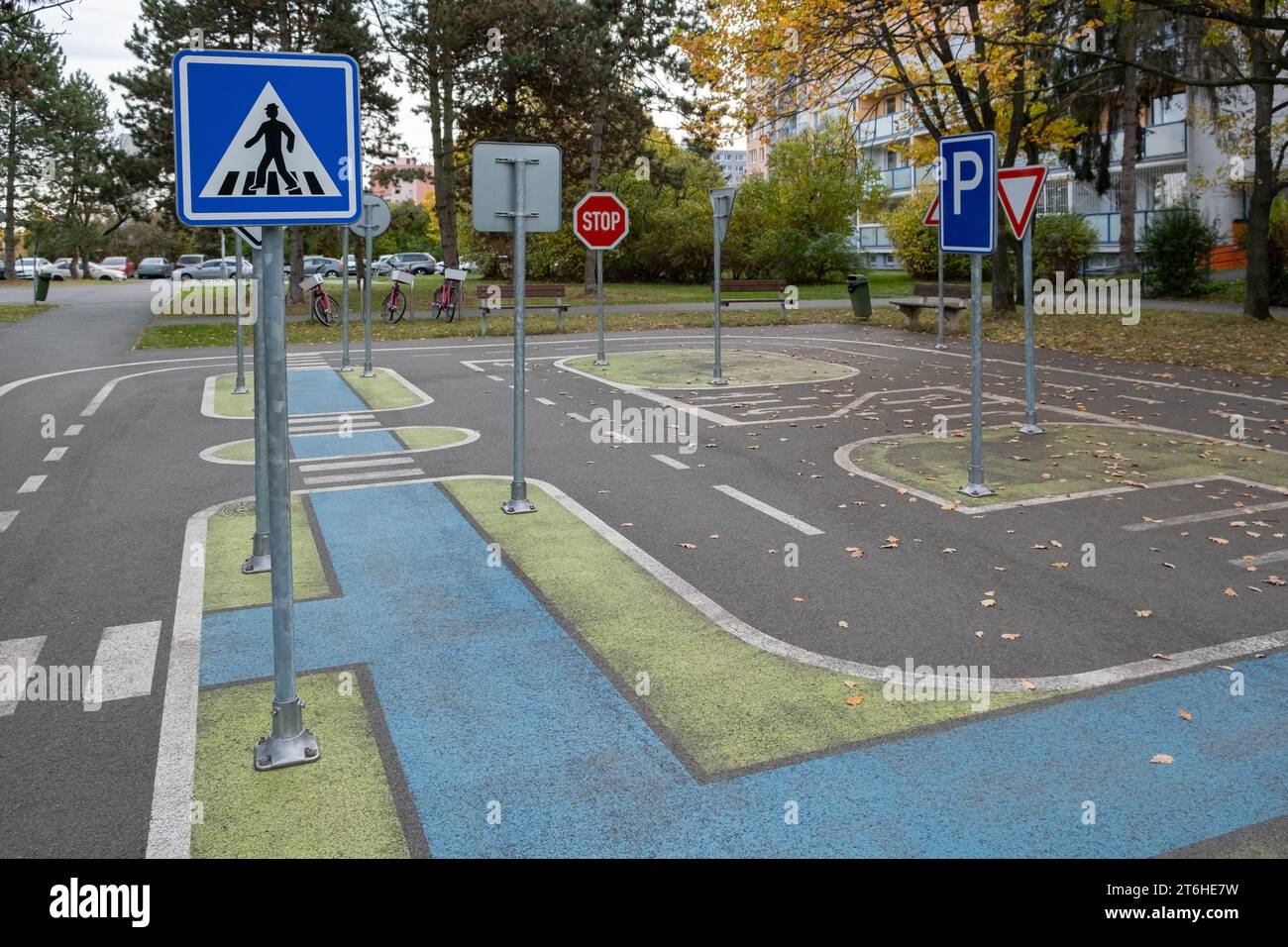 A children's playground designed as a mini road with road signs ...