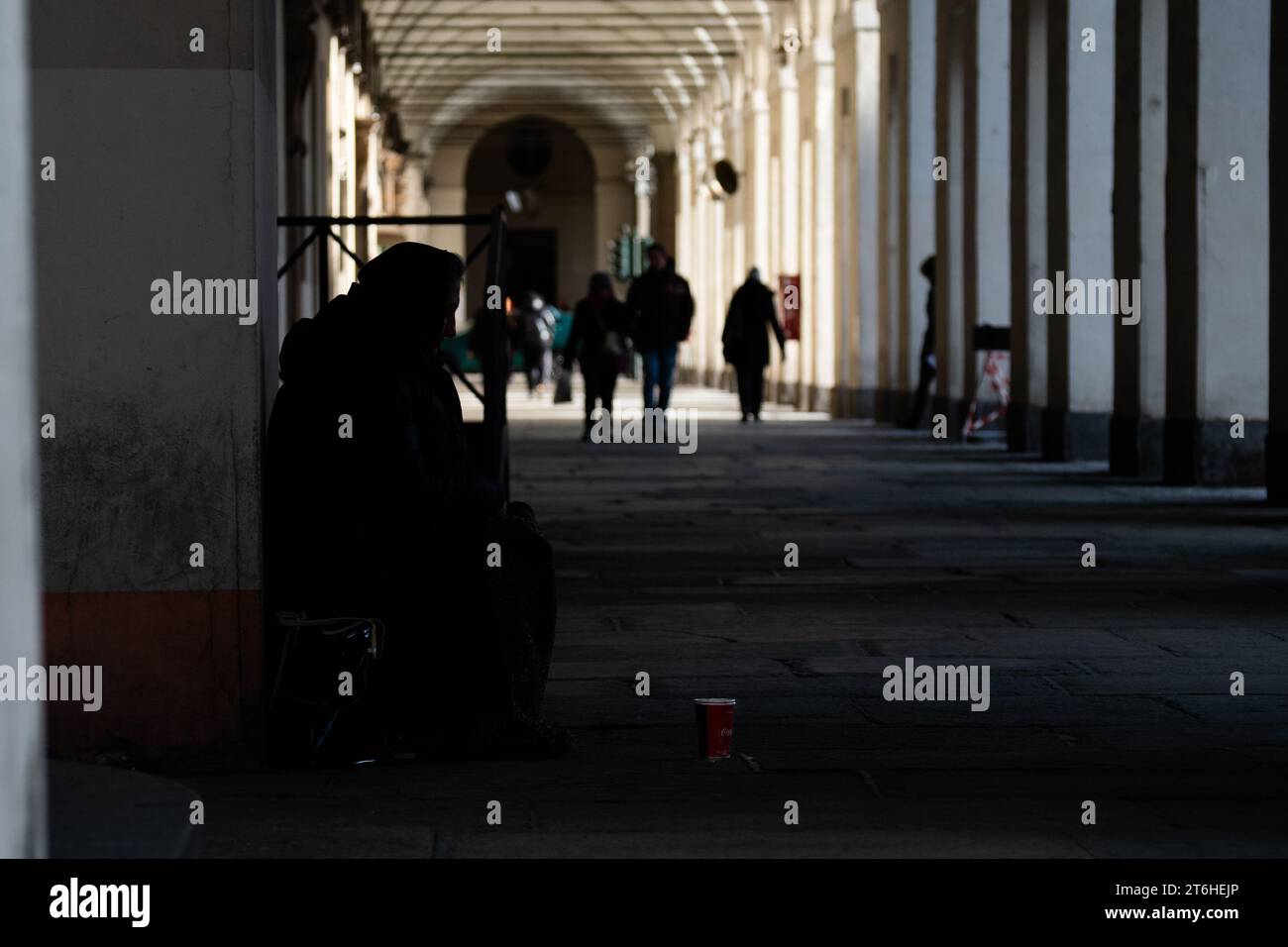 Poor woman asking charity Stock Photo - Alamy