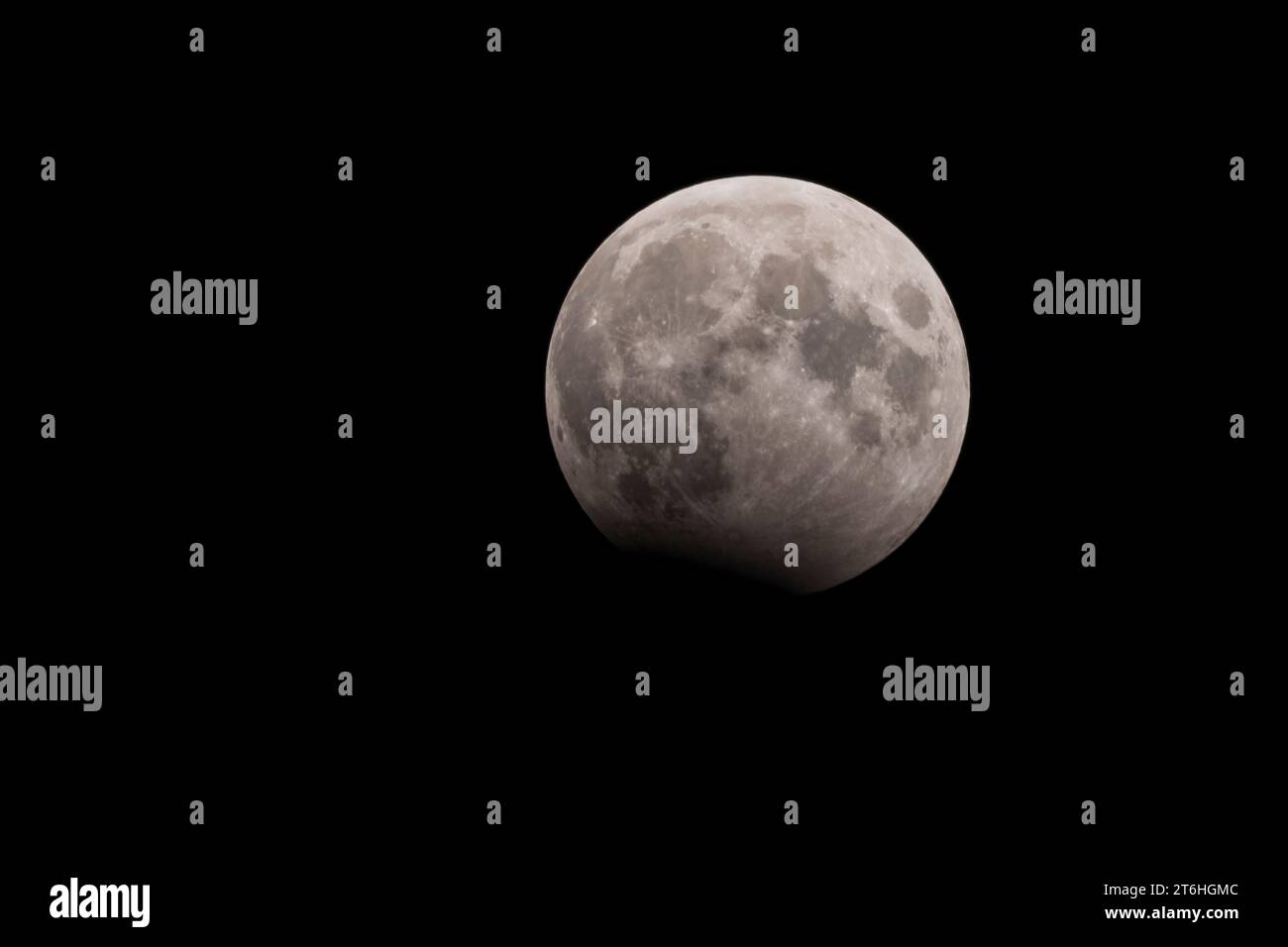 The shallow partial lunar eclipse of October 28-29, 2023, was visible ...