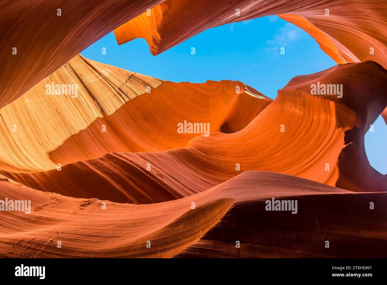 Waves ripple across the rock walls of lower Antelope Canyon, Page ...