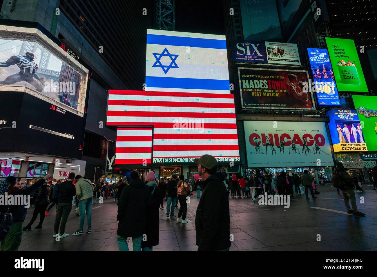 Representations of Israeli and American flags are seen in support of ...