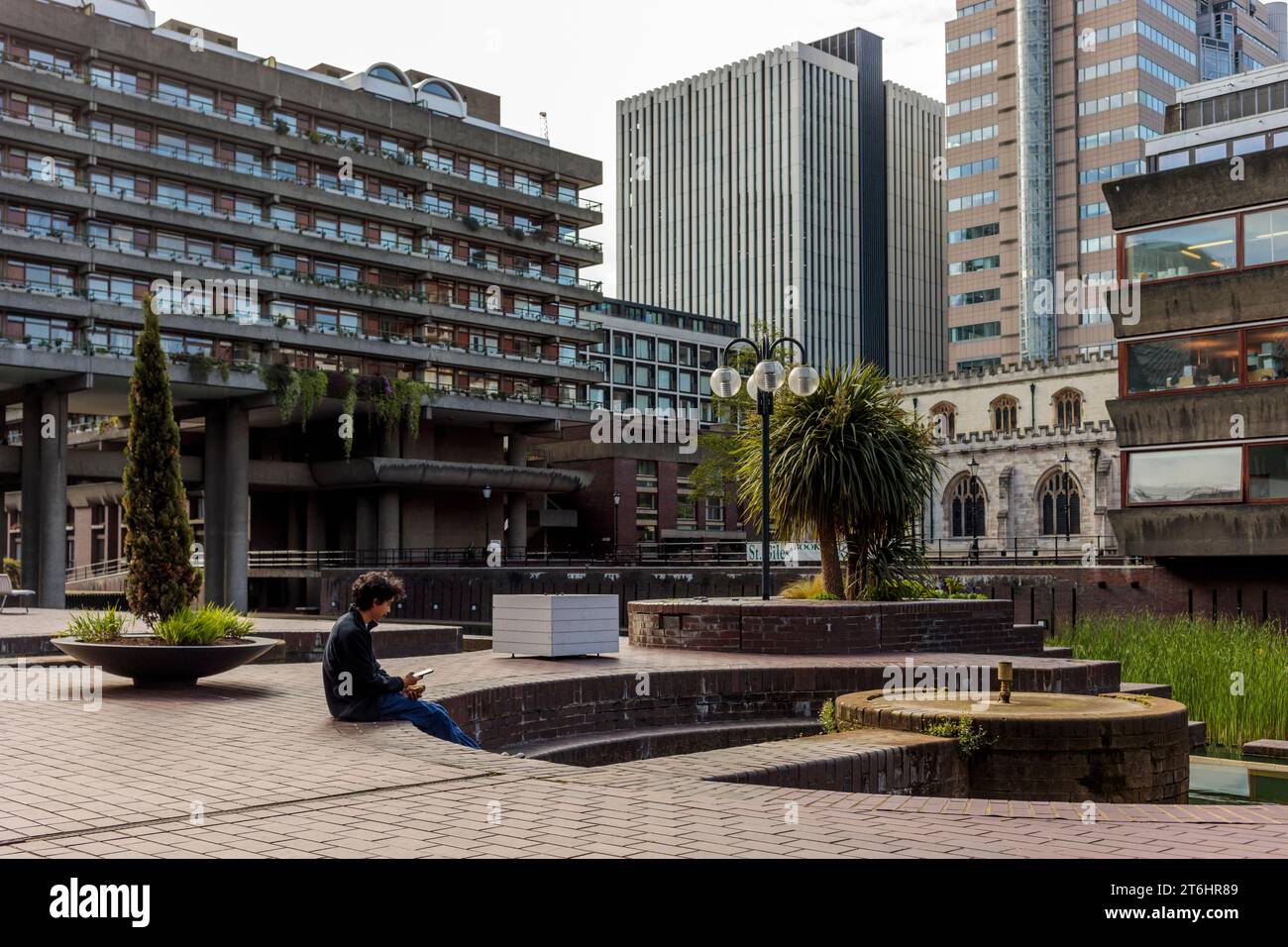 Lakeside Terrace, young man taking a break, Barbican, London, Great ...