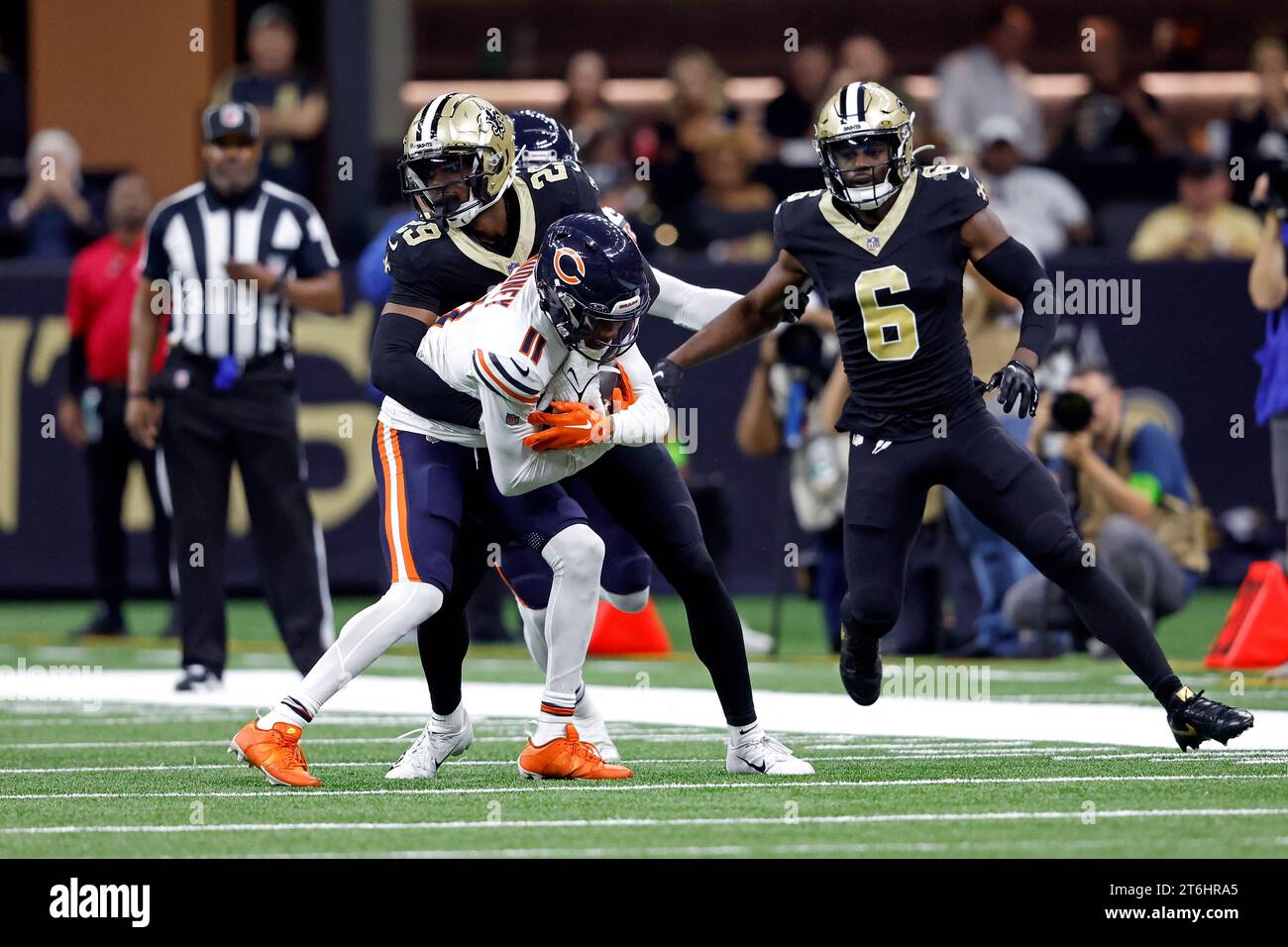 Chicago Bears wide receiver Darnell Mooney (11) is tackled by New ...
