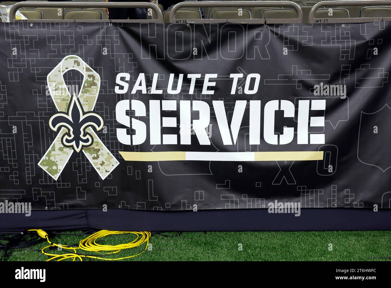 A Salute to Service banner after an NFL football game between the New ...