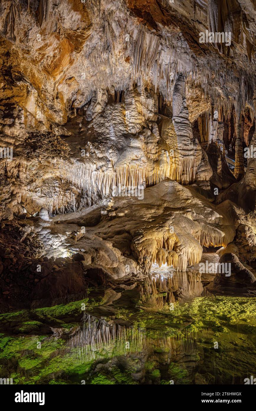 Stalactite formations and underground lake in grandes canalettes cave ...