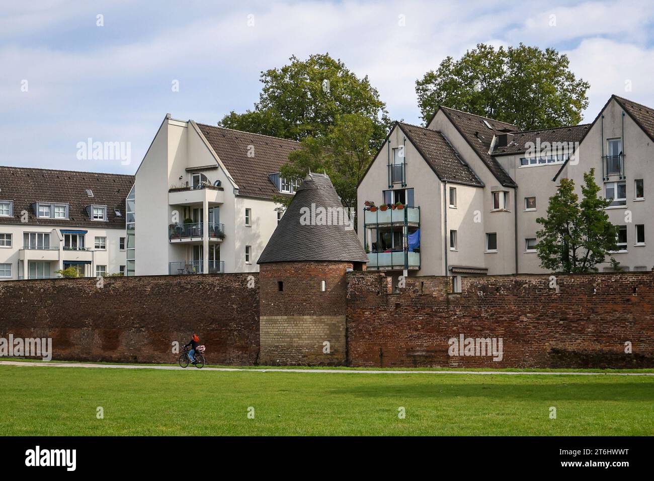 New residential buildings behind historic city wall hi-res stock ...