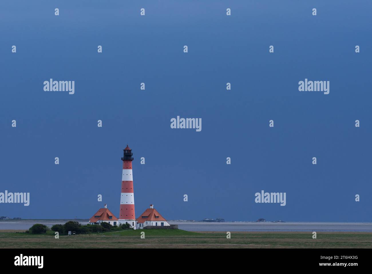 Westerheversand Lighthouse, dark sky, thunderstorm atmosphere ...