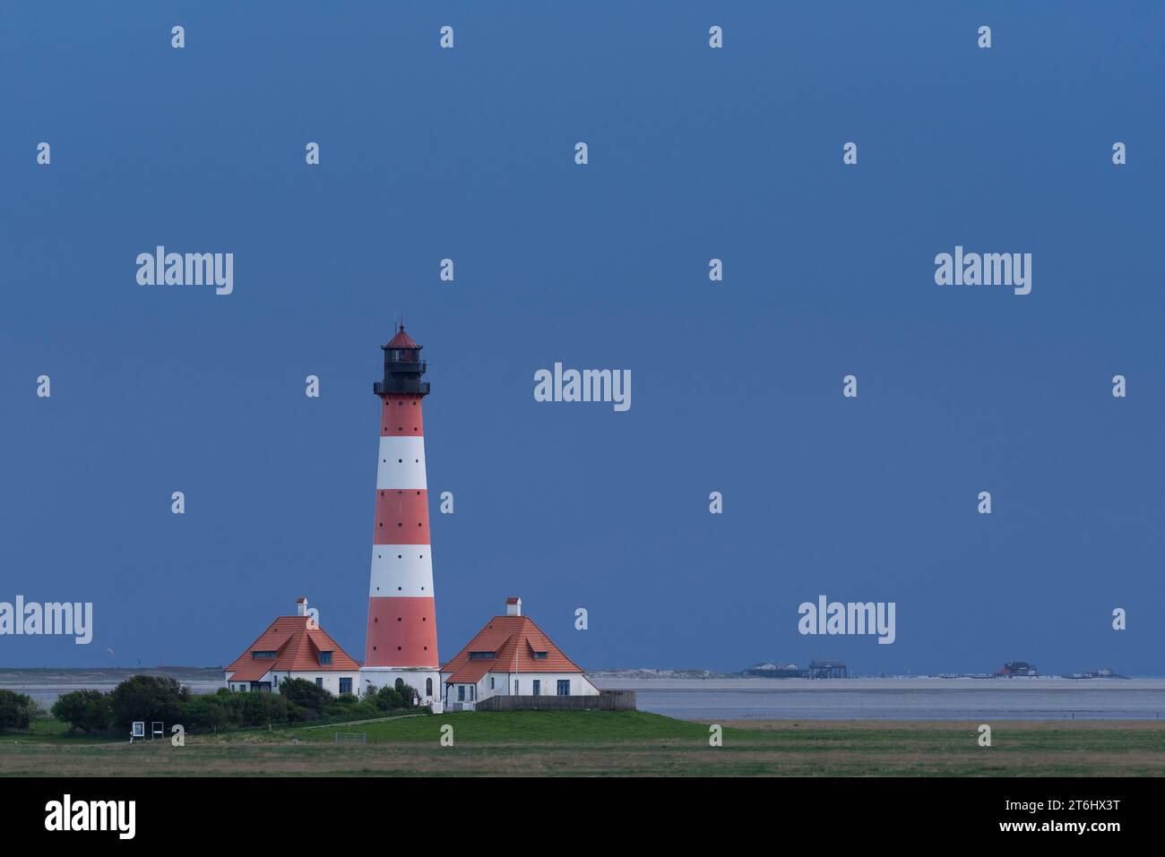 Westerheversand lighthouse, dark sky, thunderstorm atmosphere ...