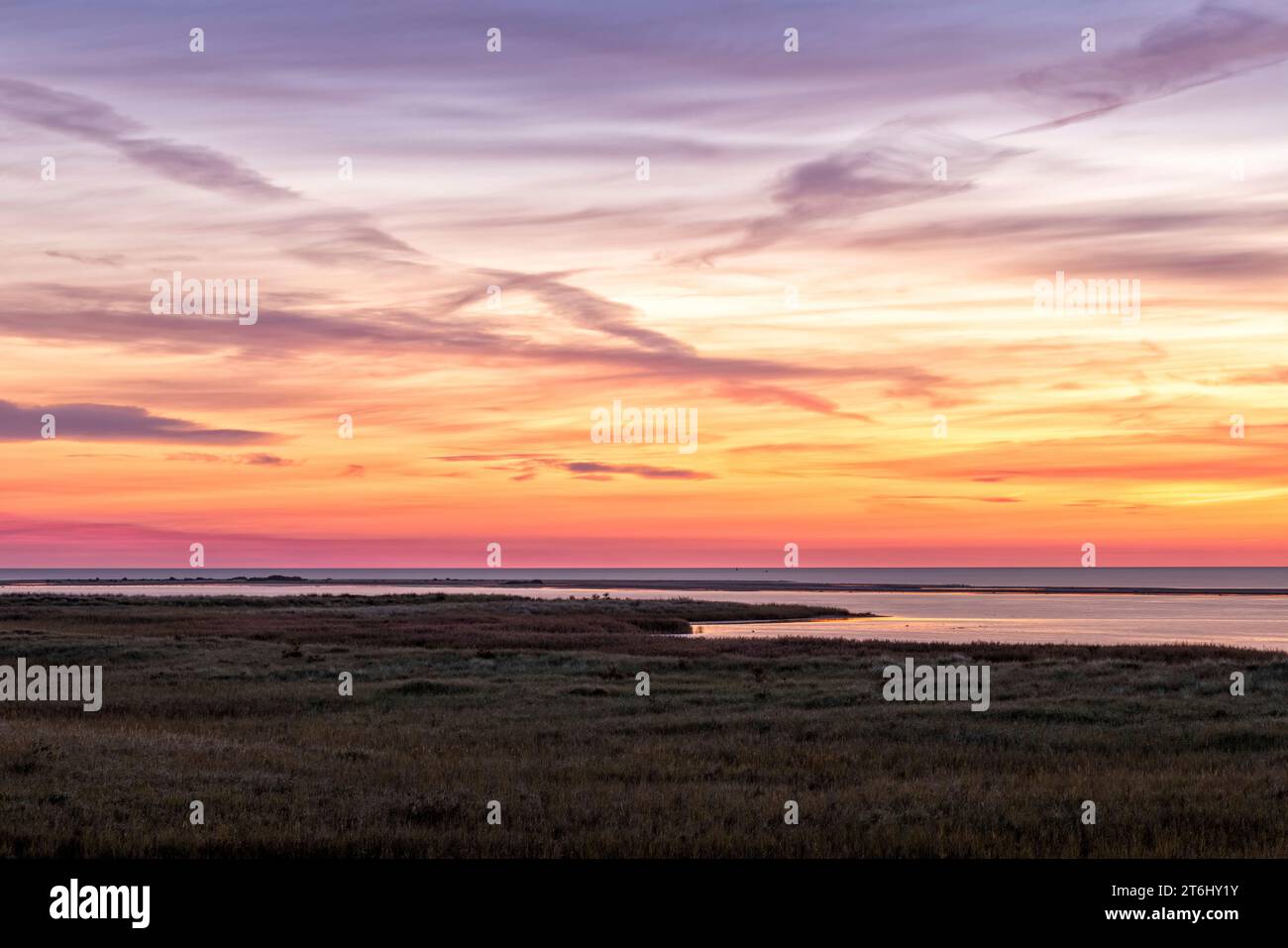 View of the Baltic Sea with dawn at the circular hiking trail Darßer ...