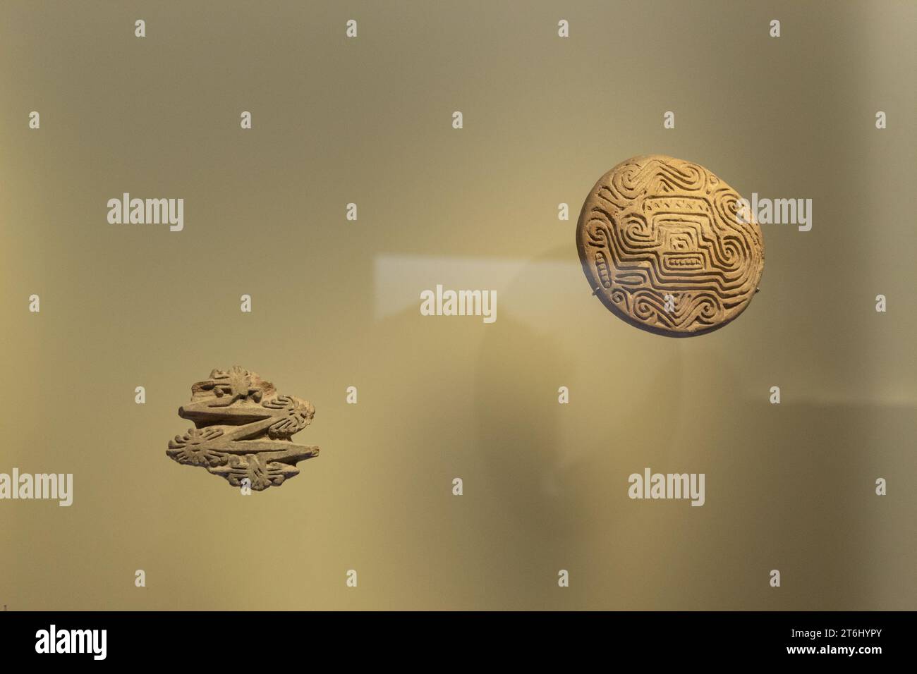 Ancient colombian stone seals into a showcase at golden colombian ...