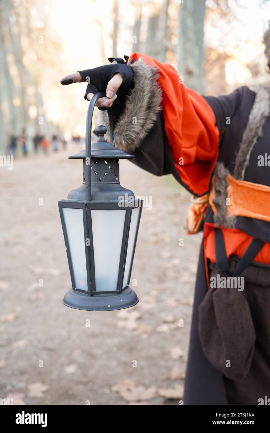 Coal man showing a lantern at carnivals in a costume. Olentzero outfit ...