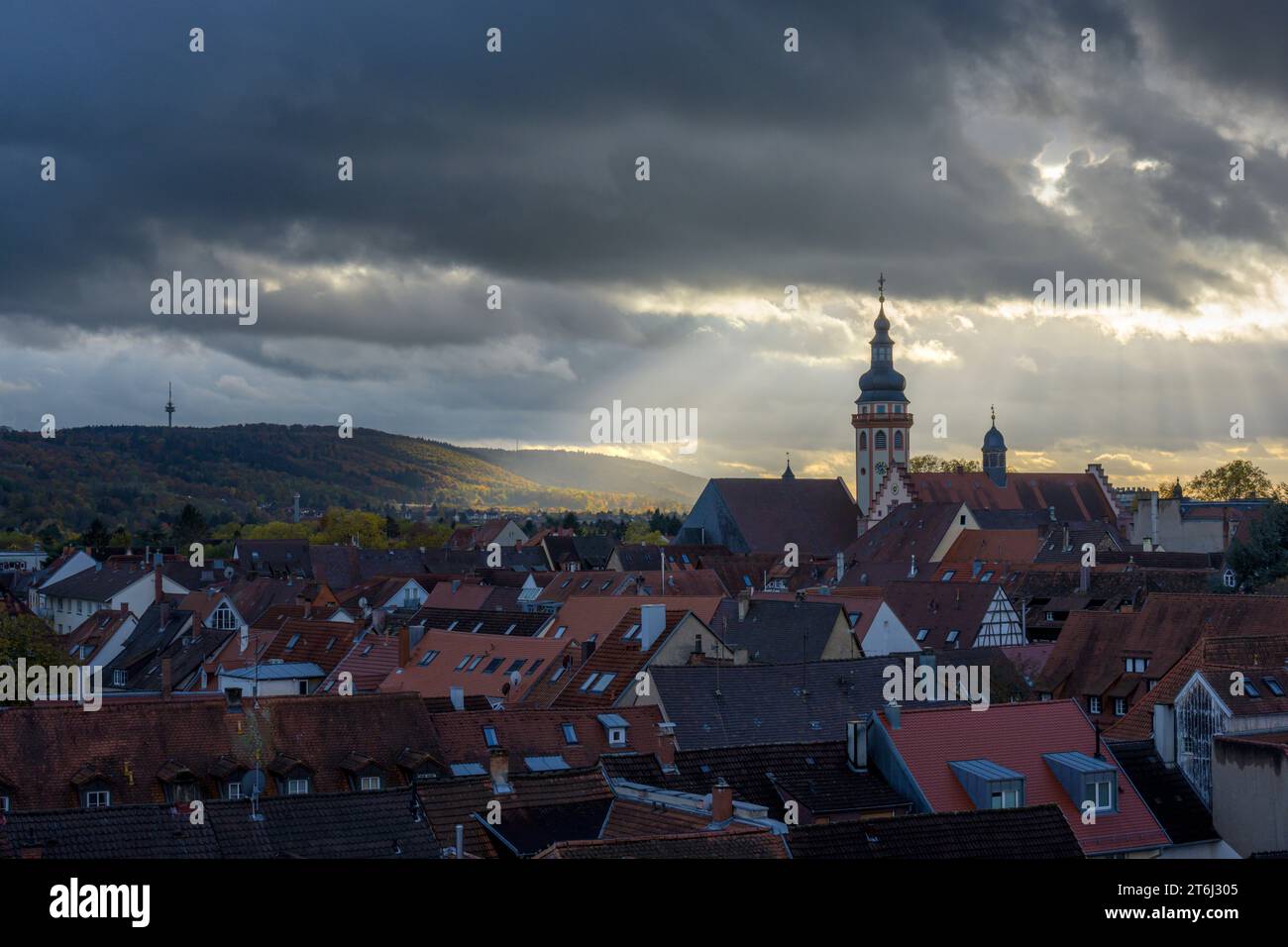 Old town silhouette of durlach with sun rays hi-res stock photography ...