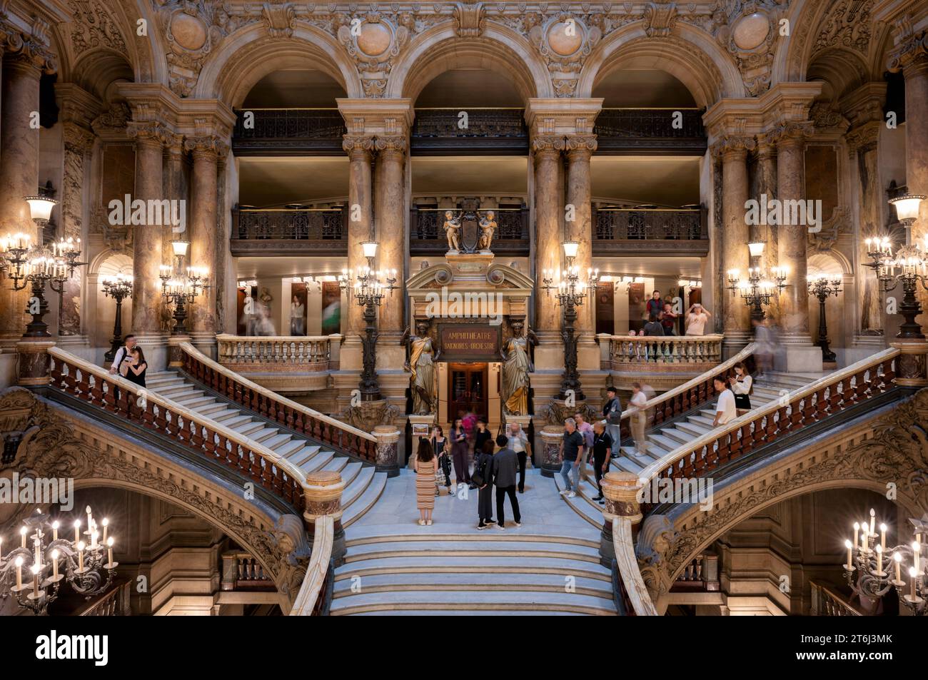 Interior view, visitors, tourists, people, on rococo marble staircase ...
