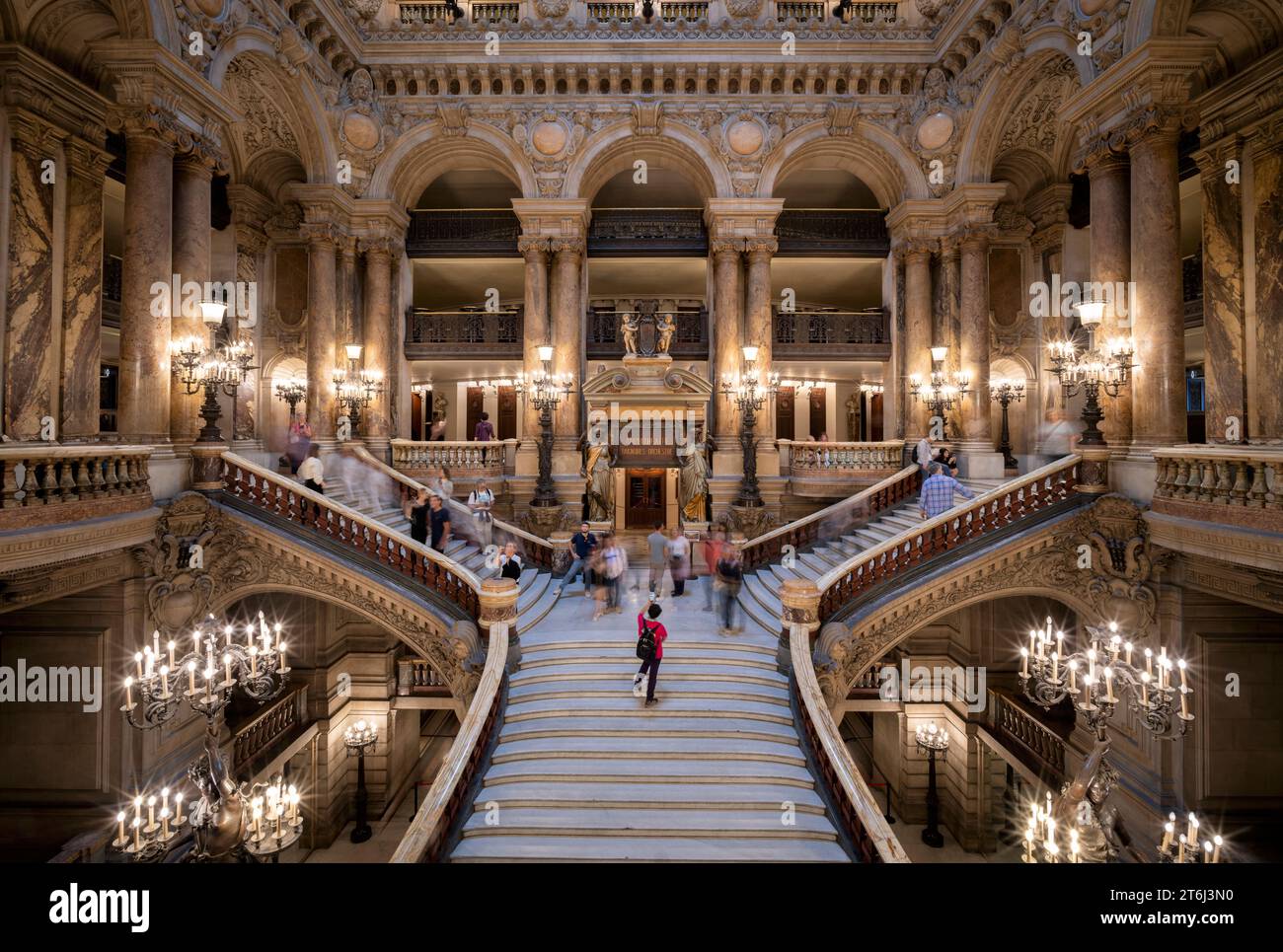 Interior view, visitors, tourists, people, on rococo marble staircase ...